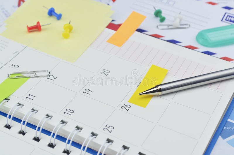 Pencil with Post it Notes and Pin on Business Diary Page Stock Photo ...