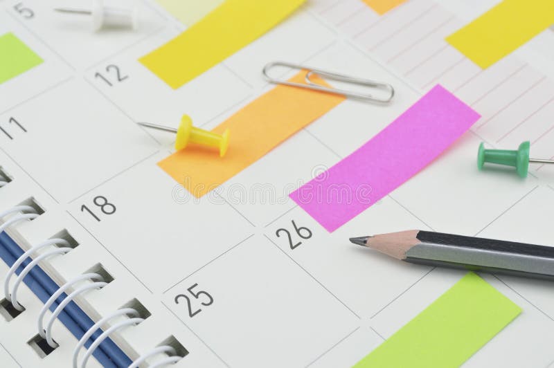 Pencil with Post it Notes and Pin on Business Diary Page Stock Photo ...