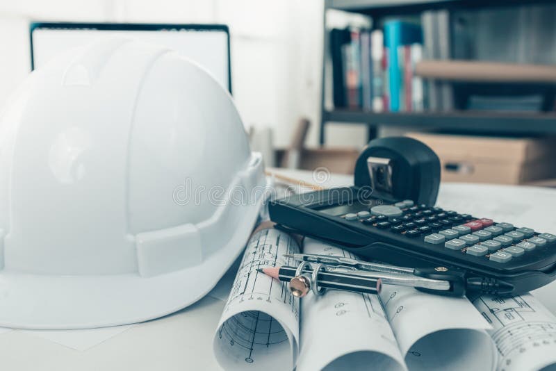 Pencil, Protractor, Compass and Calculator on Roll Blueprint Plan on ...