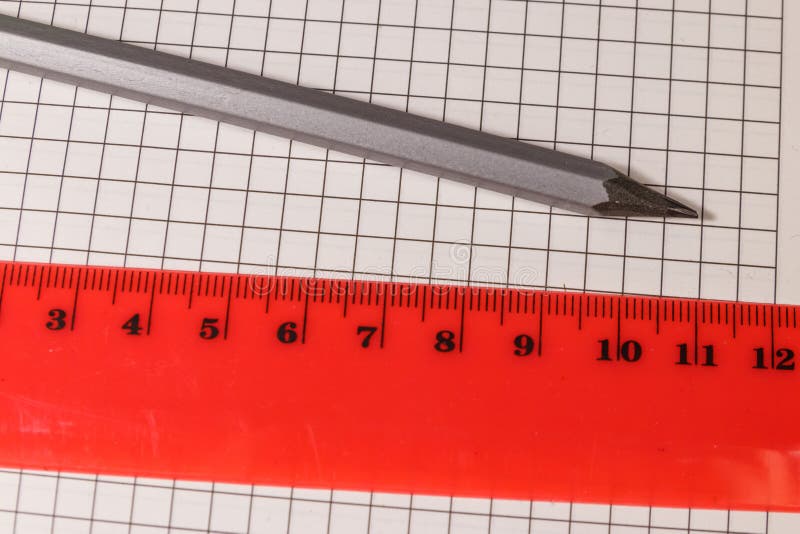 Pencil and Ruler on Notepad Sheet Stock Photo - Image of closeup ...