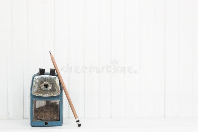 A Pencil Sharpener with Pencil on Table. Stock Photo - Image of drawing ...