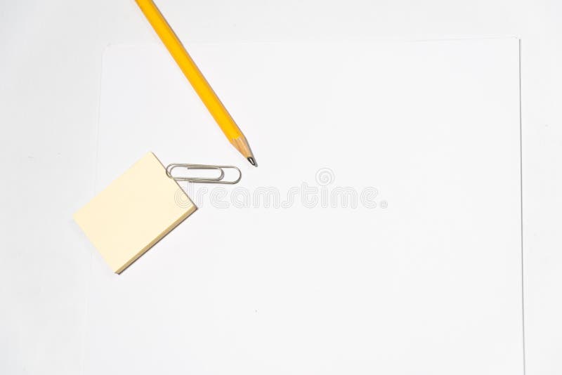 Pencil, Sticky Notes and Paper Hook on a Table Stock Image - Image of ...
