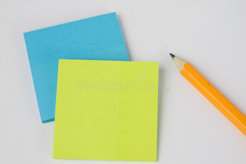 Pencil and Sticky Notes on a White Table. Office Accessories for Stock ...