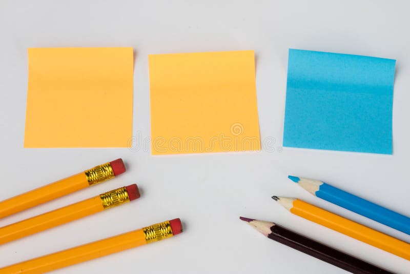 Pencil and Sticky Notes on a White Table. Office Accessories for Stock ...