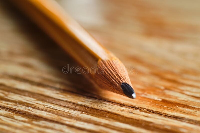 Pencil on wooden table stock photo. Image of supply - 178804936