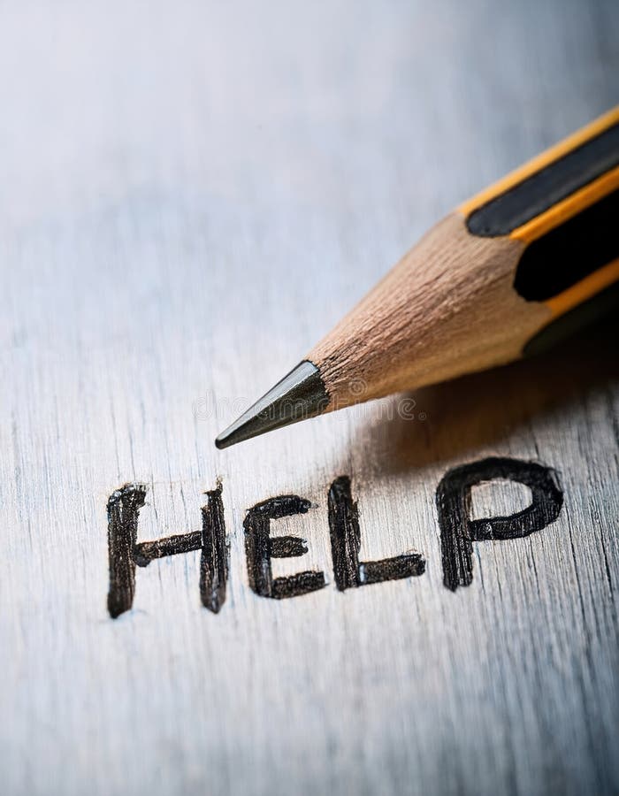 Pencil Writing Help on a Wooden Surface during a Quiet Moment of ...