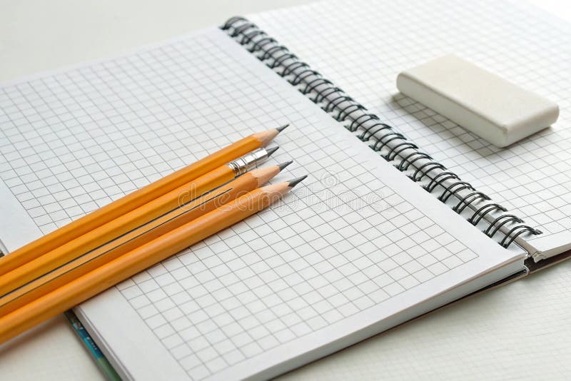 Pencils and Eraser on Graph Paper Stock Illustration - Illustration of ...