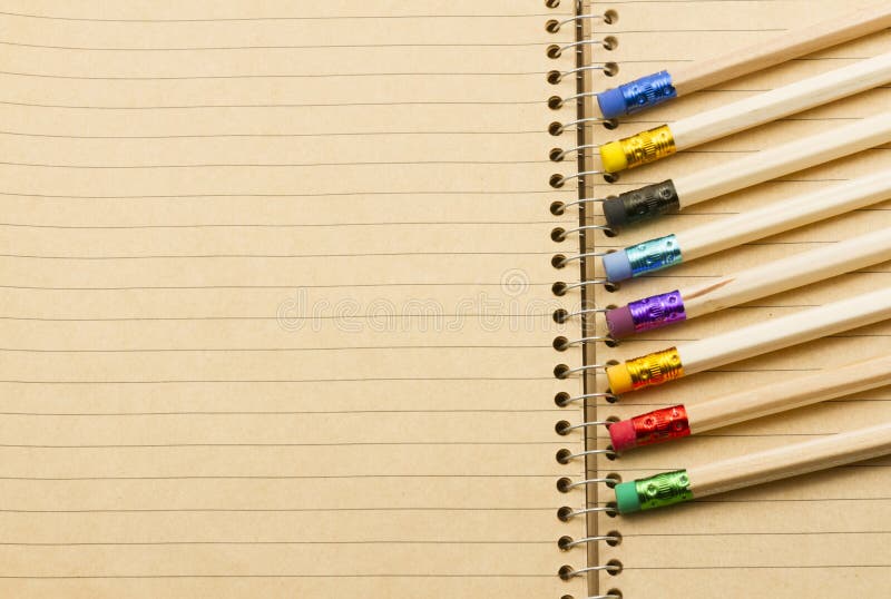 Pencils on notebook stock photo. Image of office, colorful - 29224294