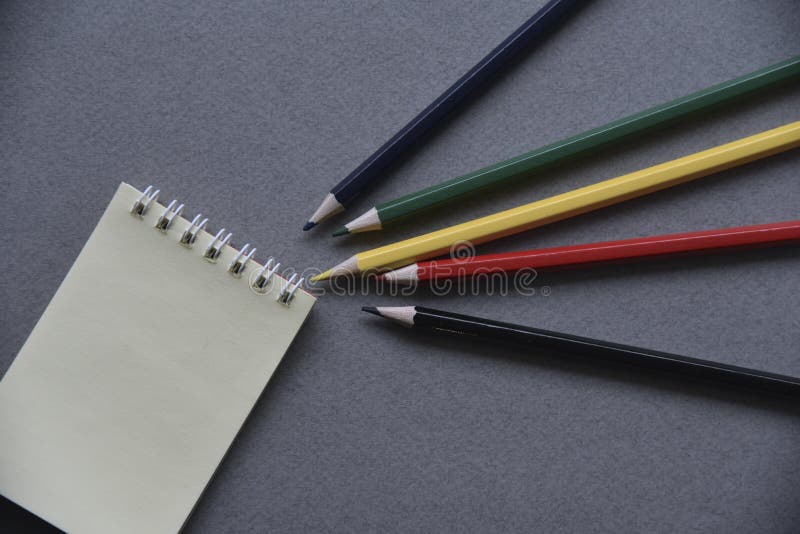 Pencils Notepad and Paper Clips on the Office Desk Stock Photo - Image ...
