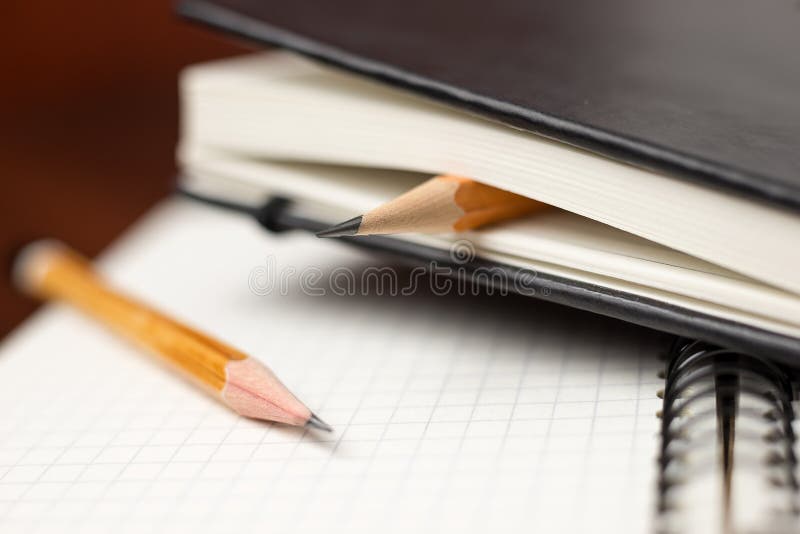 Pencils on the Pages of an Closed Notebook for Records Stock Image ...