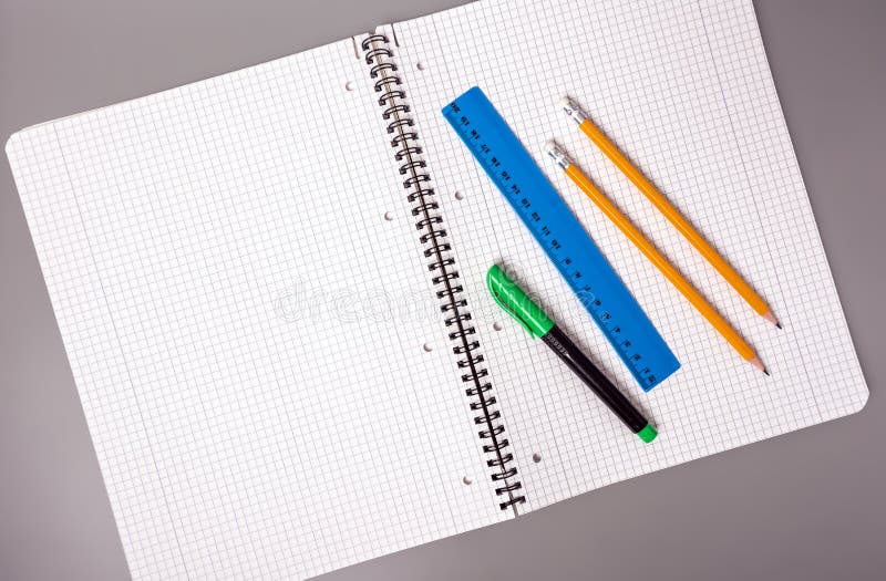 Pencils, Pen and Ruler are on an Open Notebook. Stock Image - Image of ...
