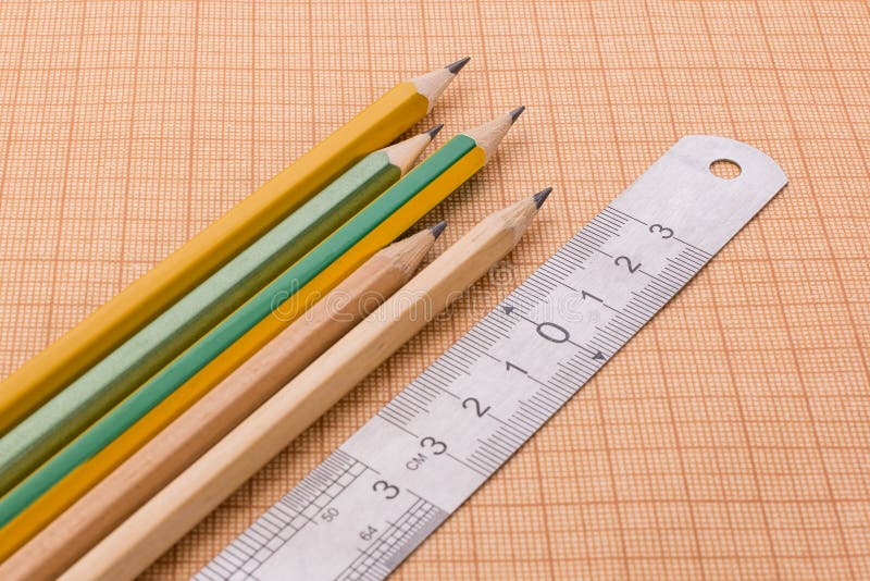 Pencils and Ruler on Graph Paper Stock Photo - Image of tool, education ...