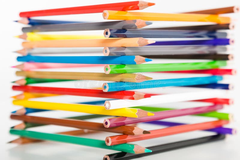 Pencils Stacked in Log House Stock Photo - Image of order, colored ...