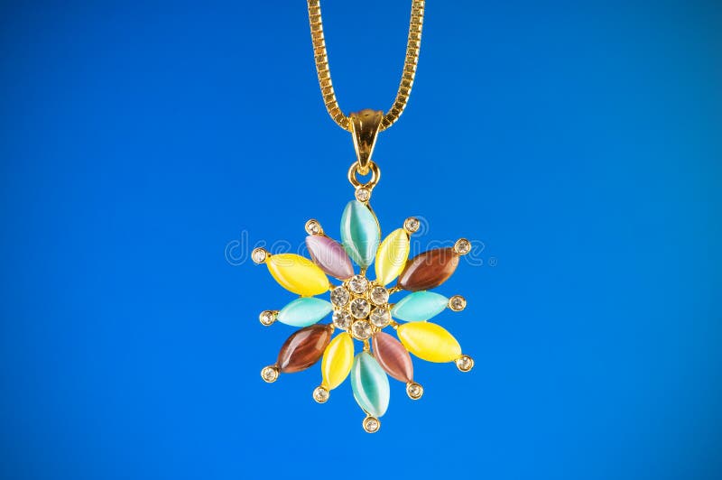 Pendant Against Colour Gradient Stock Photo - Image of necklace ...
