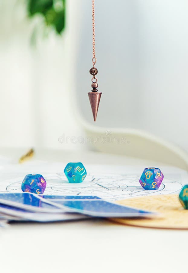 Pendulum Fortune Telling and Astrology. Selective Focus Stock Image ...