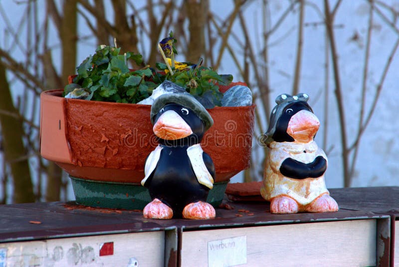 Penguins on a mailbox stock image. Image of standing - 208720967
