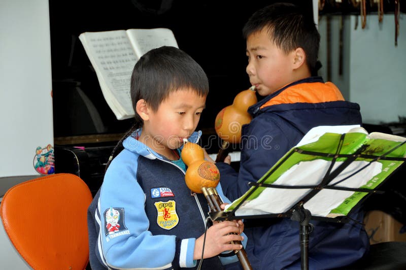Pengzhou, China: Children with Musical Instruments Editorial Stock ...