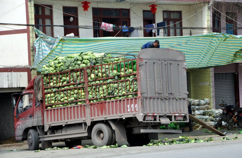 Pengzhou, China: Man Loading Truck Editorial Image - Image of transport ...