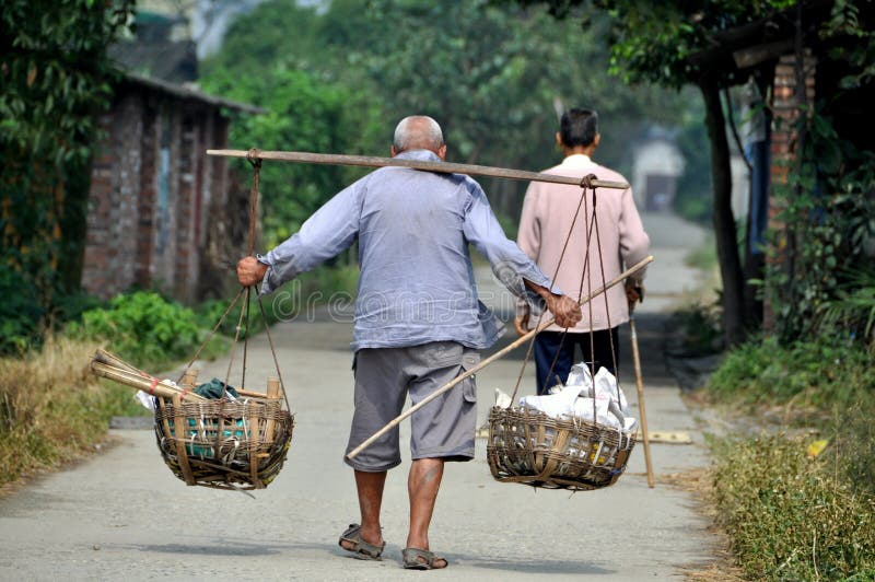 Pengzhou, China: Old Man with Shoulder Yoke Editorial Photography ...