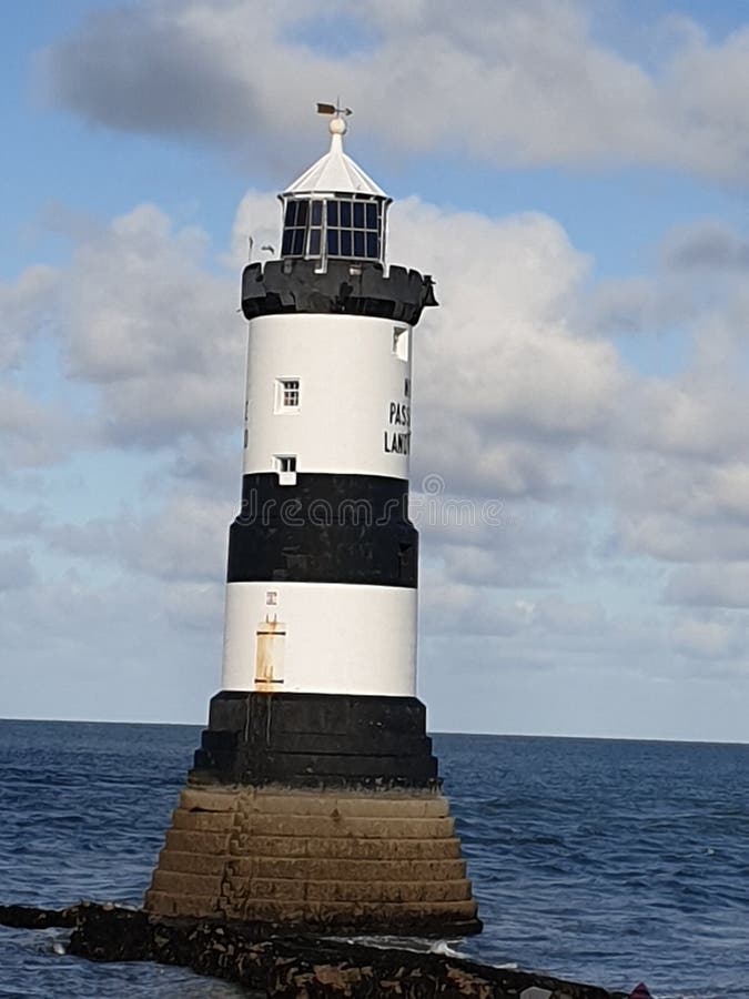 Penmon Lighthouse stock image. Image of lighthouse, rocky - 163345405