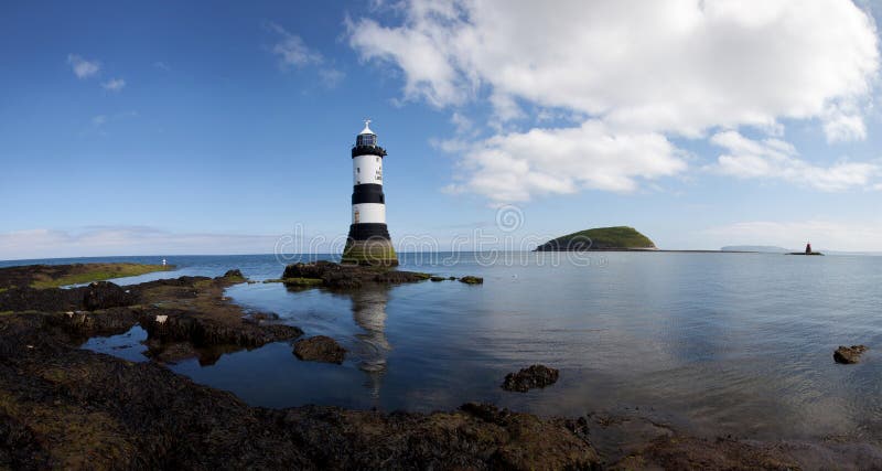 Penmon Point stock image. Image of wales, beacon, cloud - 25144451