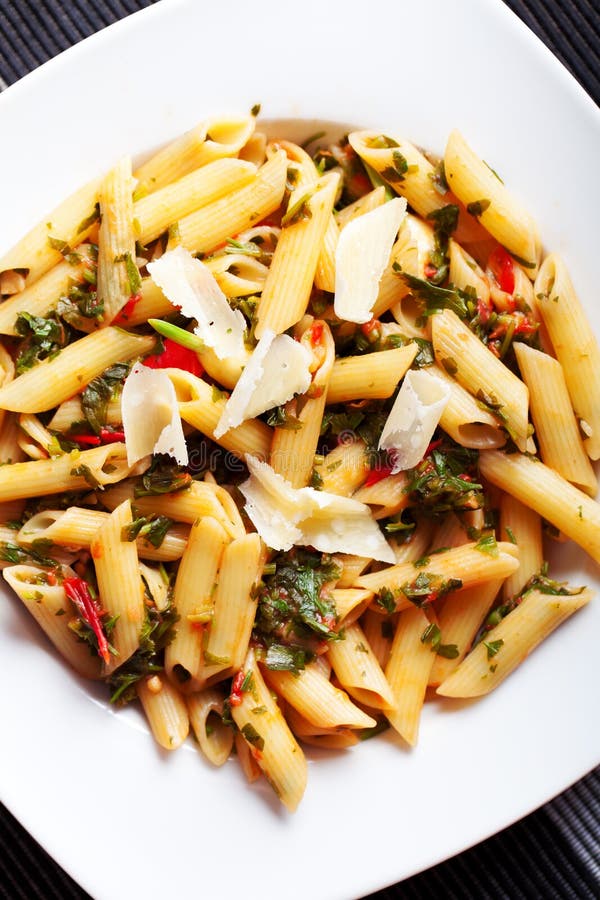 Penne with herbs stock photo. Image of meal, parmesan - 58536604