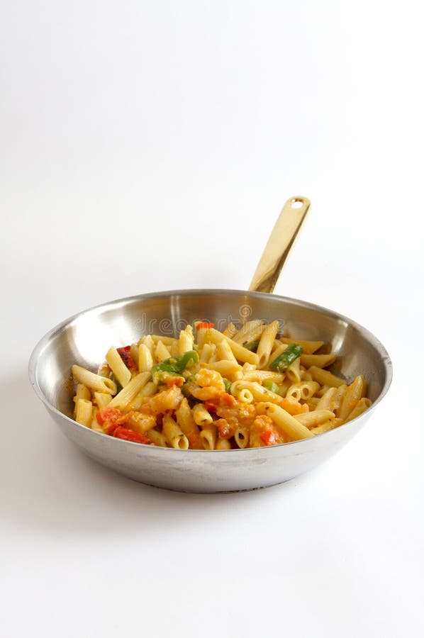 Chief add pasta in pan stock photo. Image of vegetable - 9568776