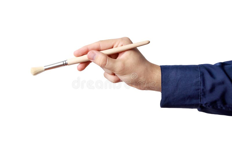 Mano che tiene un pennello immagine stock. Immagine di barretta - 12149185