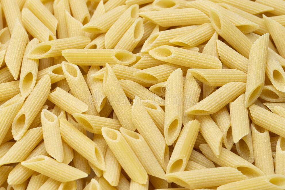 Pennette Rigate. Background of Raw Pasta Stock Photo - Image of food ...