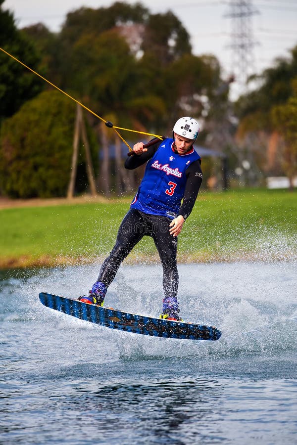 Wakeboarder in mid-air editorial image. Image of wake - 98907785