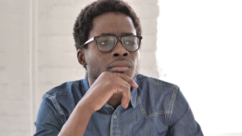Pensive African Man Thinking an Idea Stock Footage - Video of ...