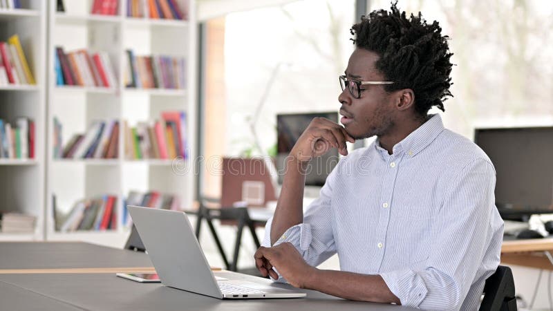 Pensive African Man Thinking at Work, Brainstorming Stock Image - Image ...