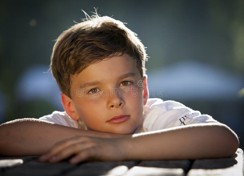 Pensive boy stock photo. Image of warm, pensive, closeup - 28111050