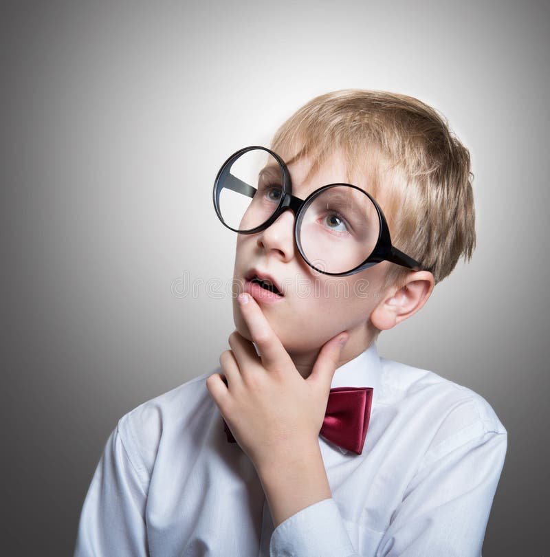 Pensive boy in the bow tie stock photo. Image of inquisitive - 45821268