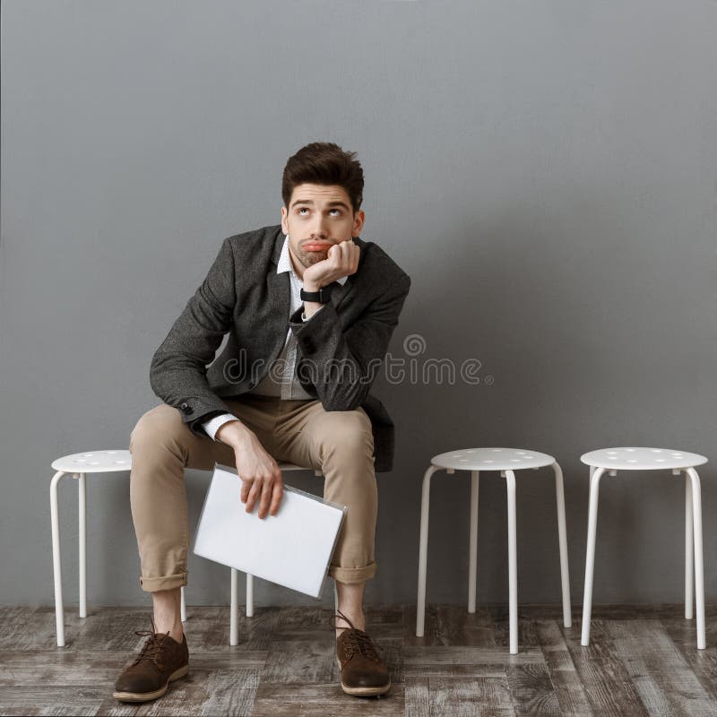 Pensive Businessman with Documents Waiting for Job Interview Stock ...