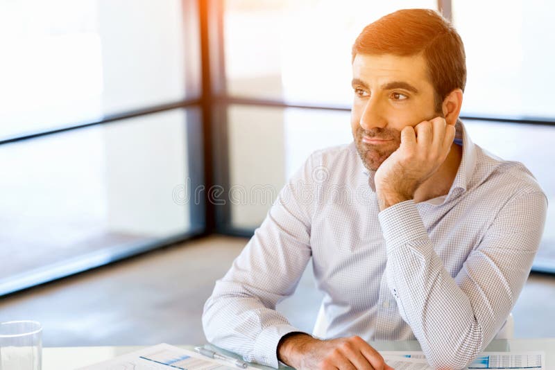 Pensive Businessman at Office Stock Photo - Image of table, portrait ...