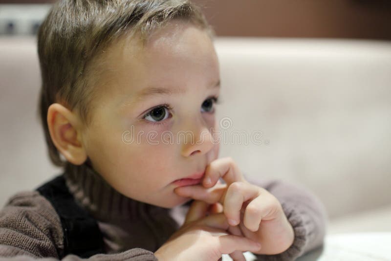 Pensive child stock photo. Image of indoor, cute, alone - 48000772
