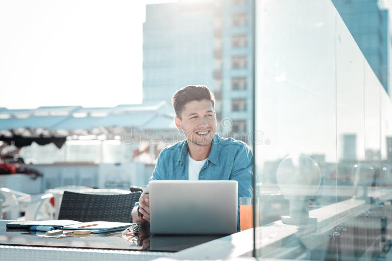 Pensive College Guy Dreaming while Doing Home Assignment Stock Photo ...