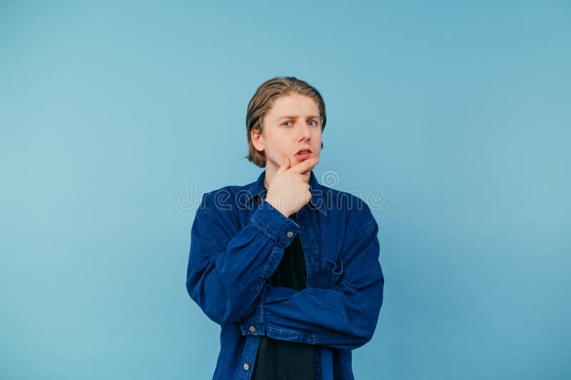 Pensive Guy Student in Shirt Isolated on Blue Background, Looking at ...
