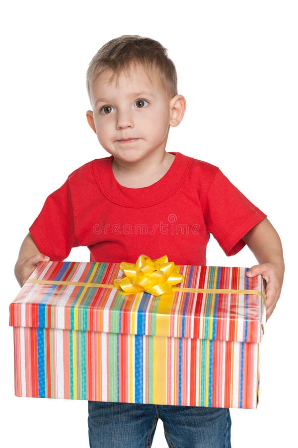 Pensive Little Boy Holds Gift Box Stock Photos - Free & Royalty-Free ...