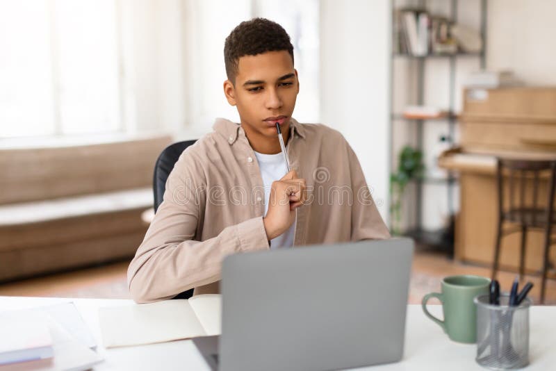 Pensive Male Working on a Laptop Stock Image - Image of decisionmaking ...
