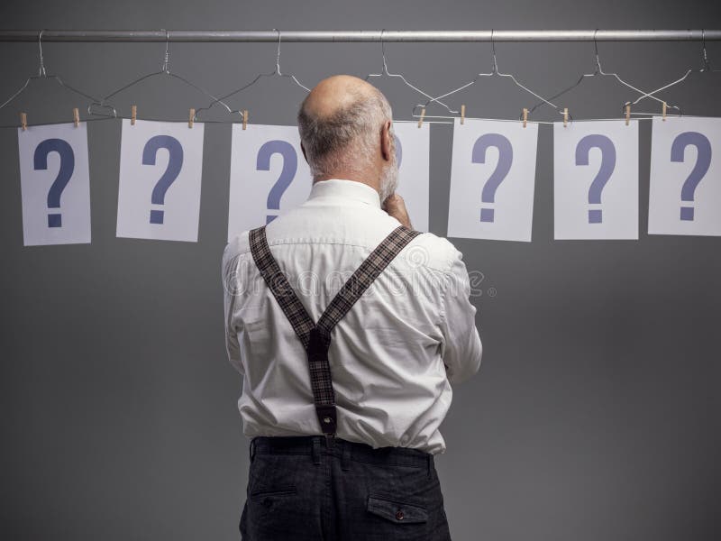 Pensive Man Comparing Different Possibilities and Questions Stock Photo ...