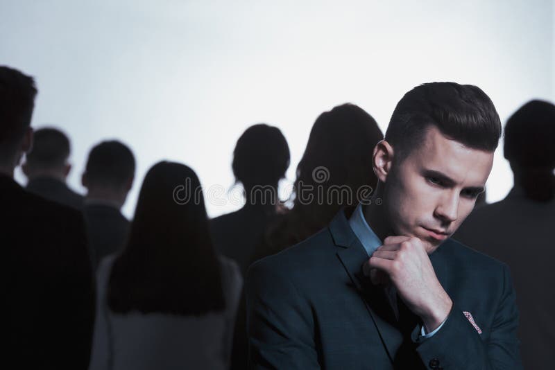 Pensive man in crowd stock image. Image of anonymity - 95151651