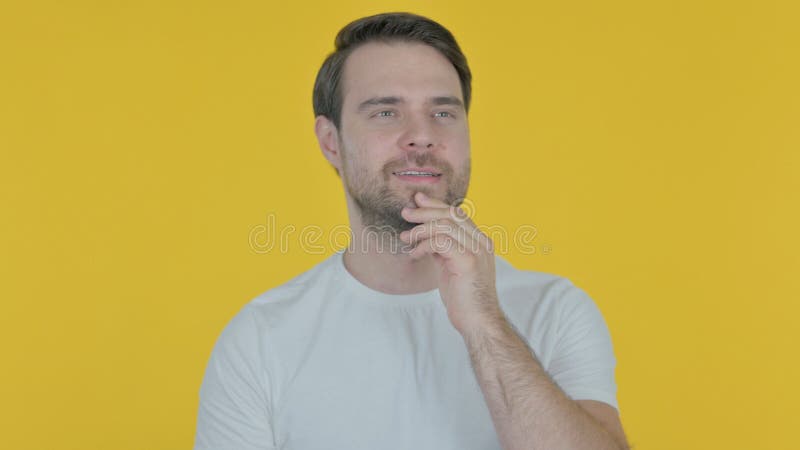 Pensive Man Thinking and Getting Idea on Yellow Background Stock Photo ...
