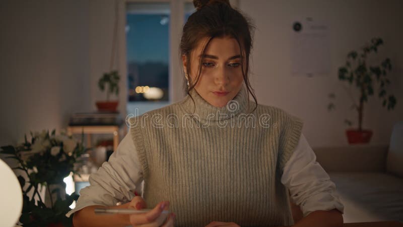 Pensive Manager Working Night at Remote Workplace Closeup. Lady Writing ...