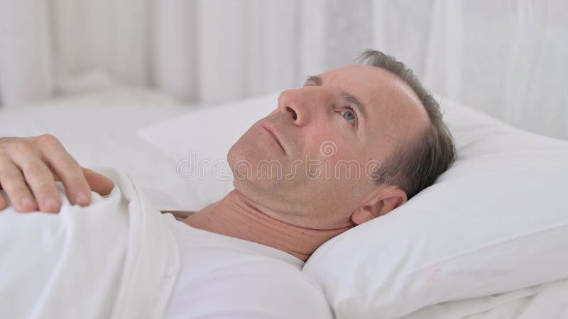 Pensive Middle Aged Man Awake in Bed Thinking Stock Image - Image of ...