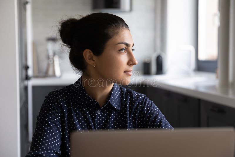 Pensive Millennial Indian Female Remote Employee Looking Aside ...