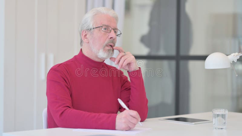 Pensive Old Man Writing on Paper, Thinking Stock Photo - Image of ...