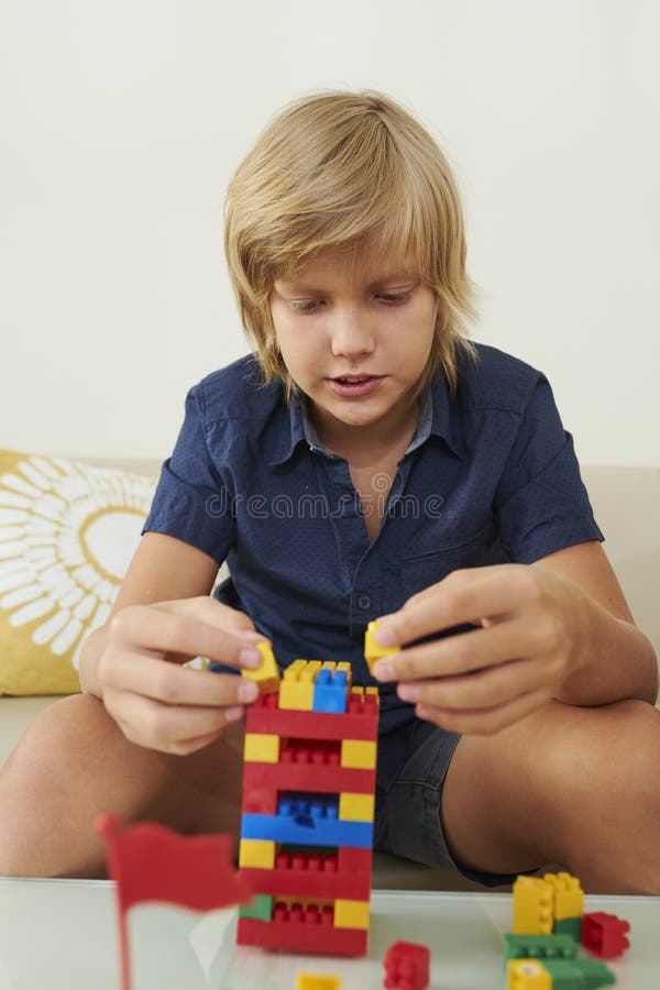 Boy Playing With Colorful Toy Blocks Stock Image - Image of females ... Boy Playing With Colorful Toy Blocks Stock Image - Image of females ...