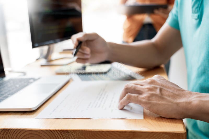 Pensive Programmer Working On On Desktop Pc Programming Code ...